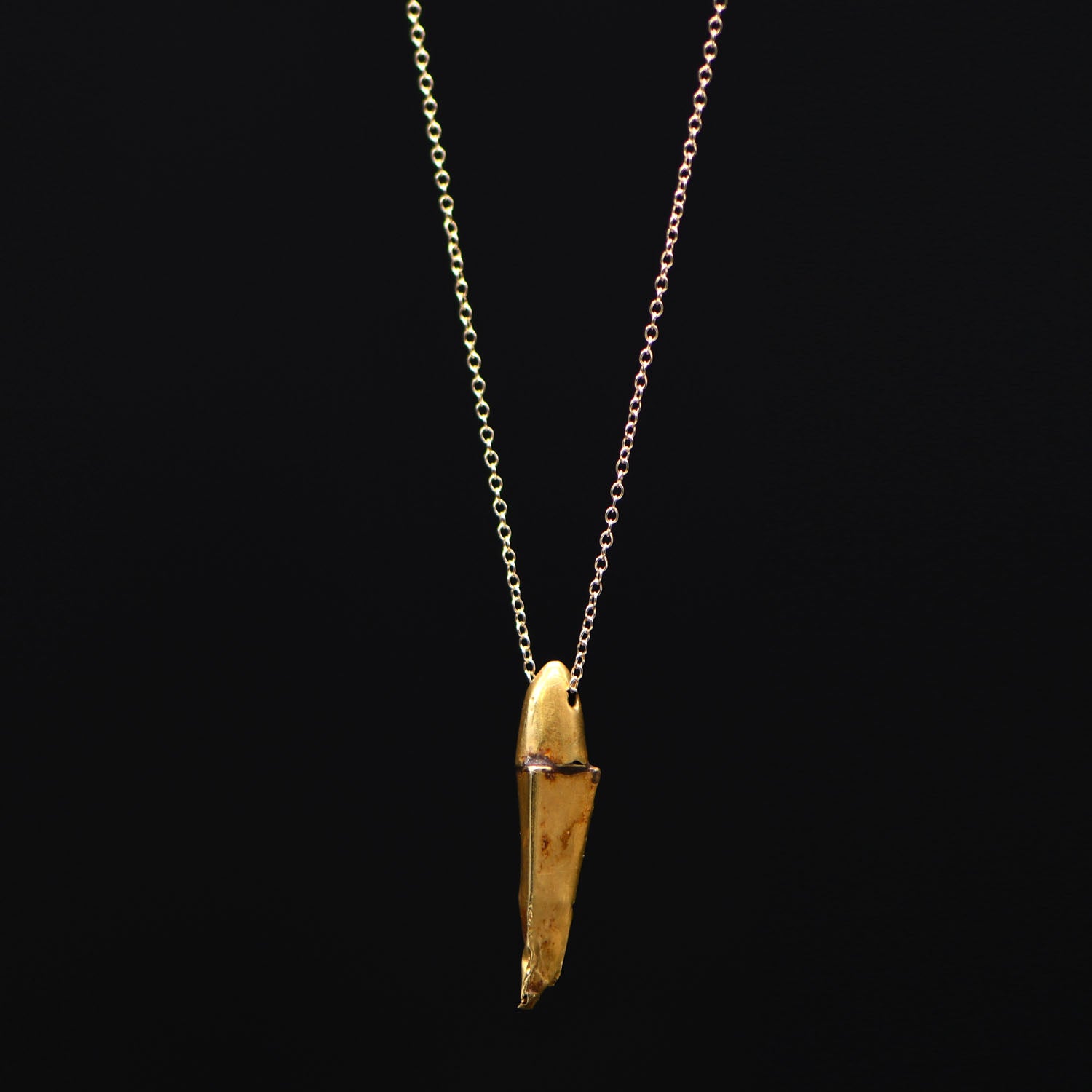 A Persian Gold Arrow-Shaped Pendant, Parthian Period, ca. 200 BCE - 20